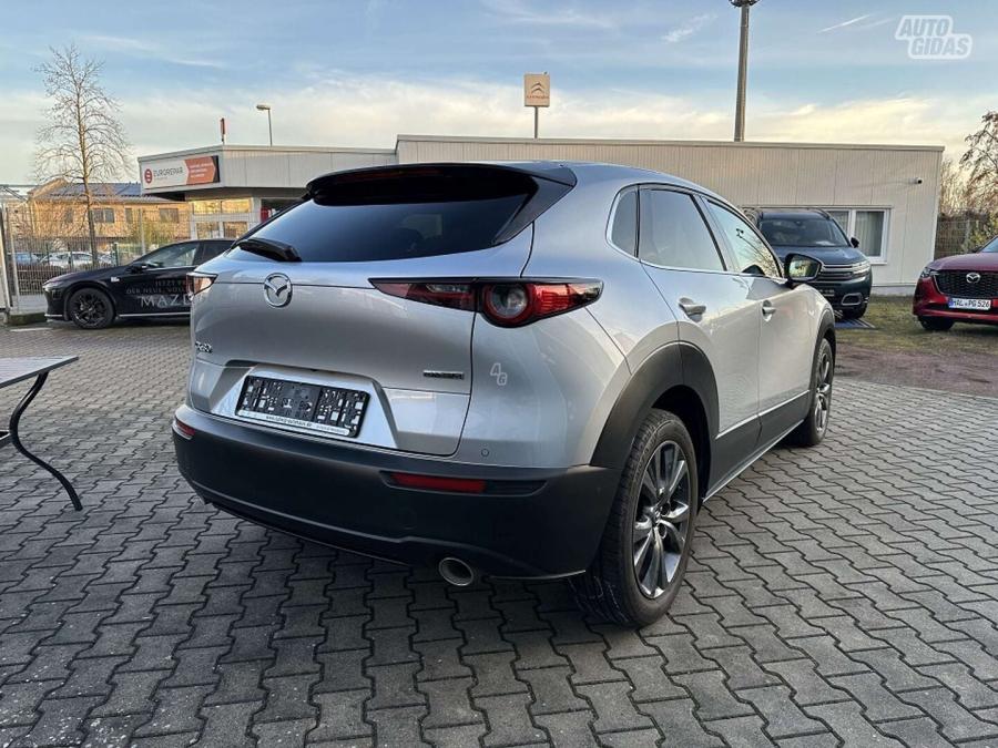 Pelēks Mazda CX-30 2021 Kauņa, ar dzinēja tilpumu 2.00 L un nobraukumu 33 tūkst. km par 24307 €, foto 5 vietnē AUTOMOTO.COM.LV