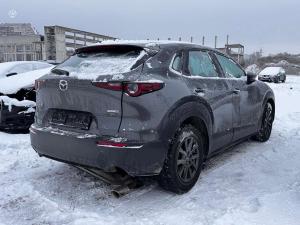 Grey Mazda CX-30 2021 in Riga, with an engine capacity of 2.00 L and mileage of 55 thousand km for 7700 €, photo 3 on AUTOMOTO.COM.LV