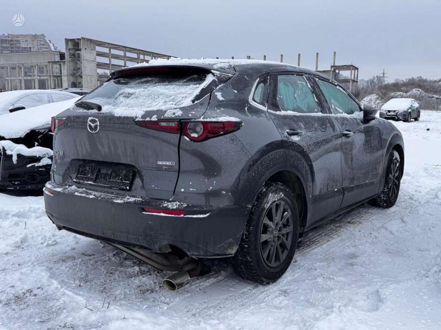 Grey Mazda CX-30 2021 in Riga, with an engine capacity of 2.00 L and mileage of 55 thousand km for 7700 €, photo 3 on AUTOMOTO.COM.LV