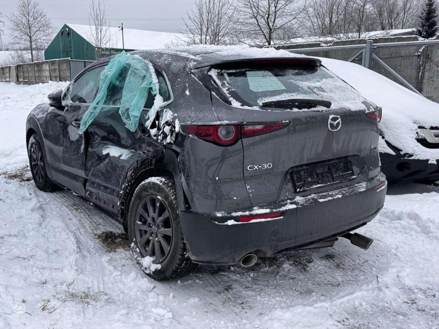 Grey Mazda CX-30 2021 in Riga, with an engine capacity of 2.00 L and mileage of 55 thousand km for 7700 €, photo 4 on AUTOMOTO.COM.LV