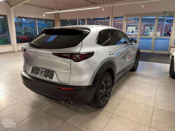 Grey Mazda CX-30 2022 in Kaunas, with an engine capacity of 2.00 L and mileage of 50 thousand km for 28570 €, photo 9 on AUTOMOTO.COM.LV