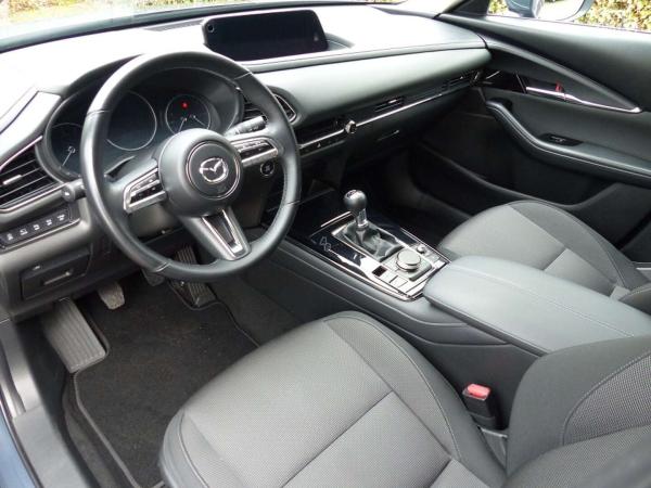 Grey Mazda CX-30 2022 in Kaunas, with an engine capacity of 2.00 L and mileage of 25 thousand km for 26417 €, photo 10 on AUTOMOTO.COM.LV