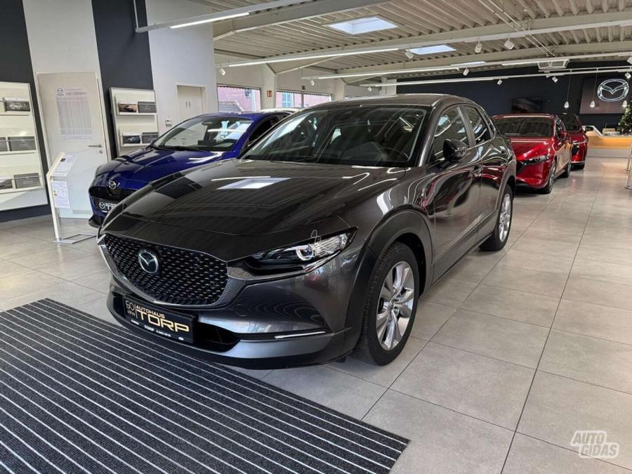 Grey Mazda CX-30 2022 in Kaunas, with an engine capacity of 2.00 L and mileage of 50 thousand km for 27972 €, photo 1 on AUTOMOTO.COM.LV