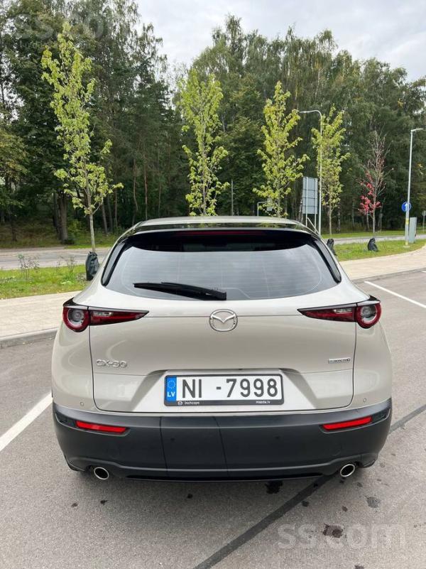 Mazda CX-30 2022 Rīga vietnē Pelēks Mazda CX-30 2022 Rīga, ar dzinēja tilpumu 2.00 L un nobraukumu 33 tūkst. km par 19000 €, foto 6 vietnē AUTOMOTO.COM.LV