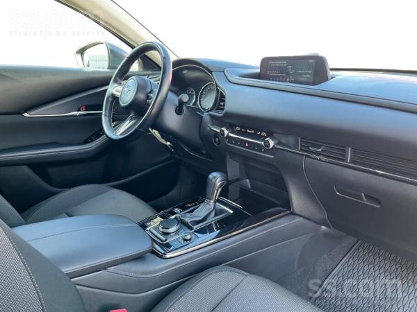 Grey Mazda CX-30 2023 in Riga, with an engine capacity of 2.00 L and mileage of 118 thousand km for 18990 €, photo 6 on AUTOMOTO.COM.LV