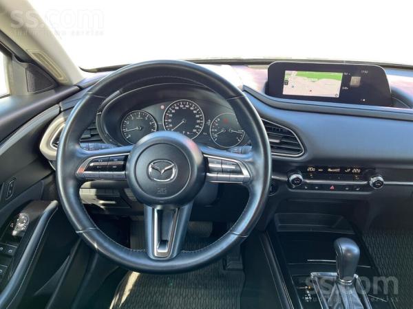 Grey Mazda CX-30 2023 in Riga, with an engine capacity of 2.00 L and mileage of 118 thousand km for 18990 €, photo 9 on AUTOMOTO.COM.LV