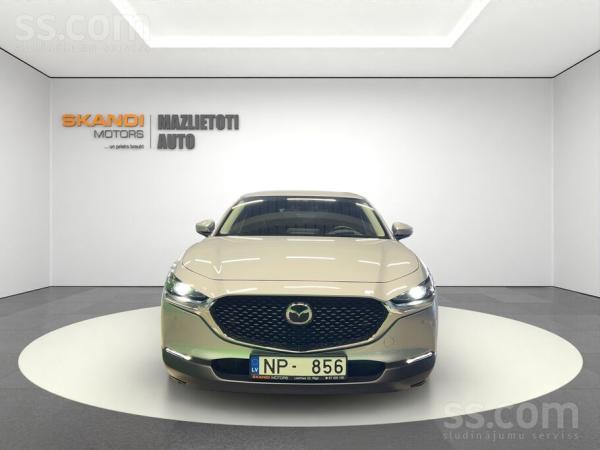 Grey Mazda CX-30 2023 in Riga, with an engine capacity of 2.00 L and mileage of 20 thousand km for 21490 €, photo 3 on AUTOMOTO.COM.LV