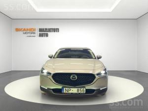 Grey Mazda CX-30 2023 in Riga, with an engine capacity of 2.00 L and mileage of 20 thousand km for 21490 €, photo 3 on AUTOMOTO.COM.LV