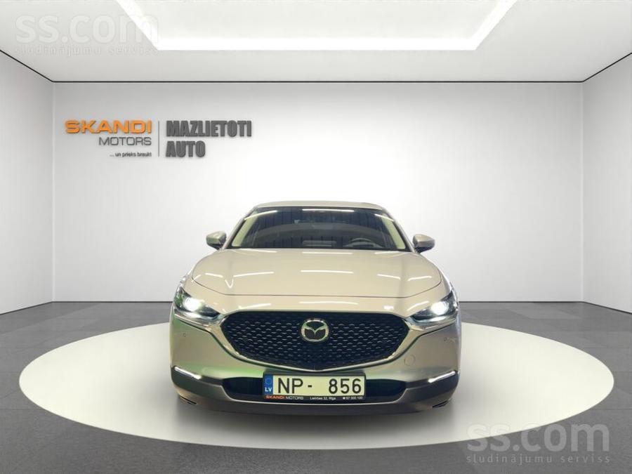 Grey Mazda CX-30 2023 in Riga, with an engine capacity of 2.00 L and mileage of 20 thousand km for 21490 €, photo 3 on AUTOMOTO.COM.LV