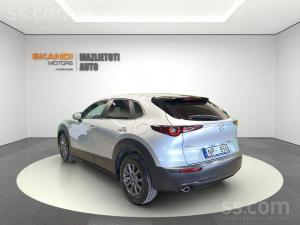 Grey Mazda CX-30 2023 in Riga, with an engine capacity of 2.00 L and mileage of 20 thousand km for 21490 €, photo 5 on AUTOMOTO.COM.LV