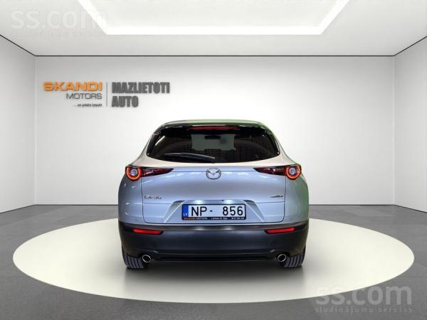 Grey Mazda CX-30 2023 in Riga, with an engine capacity of 2.00 L and mileage of 20 thousand km for 21490 €, photo 6 on AUTOMOTO.COM.LV