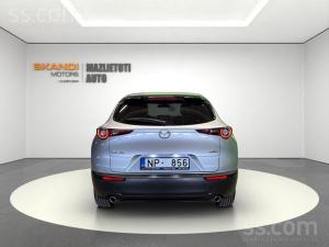 Grey Mazda CX-30 2023 in Riga, with an engine capacity of 2.00 L and mileage of 20 thousand km for 21490 €, photo 6 on AUTOMOTO.COM.LV