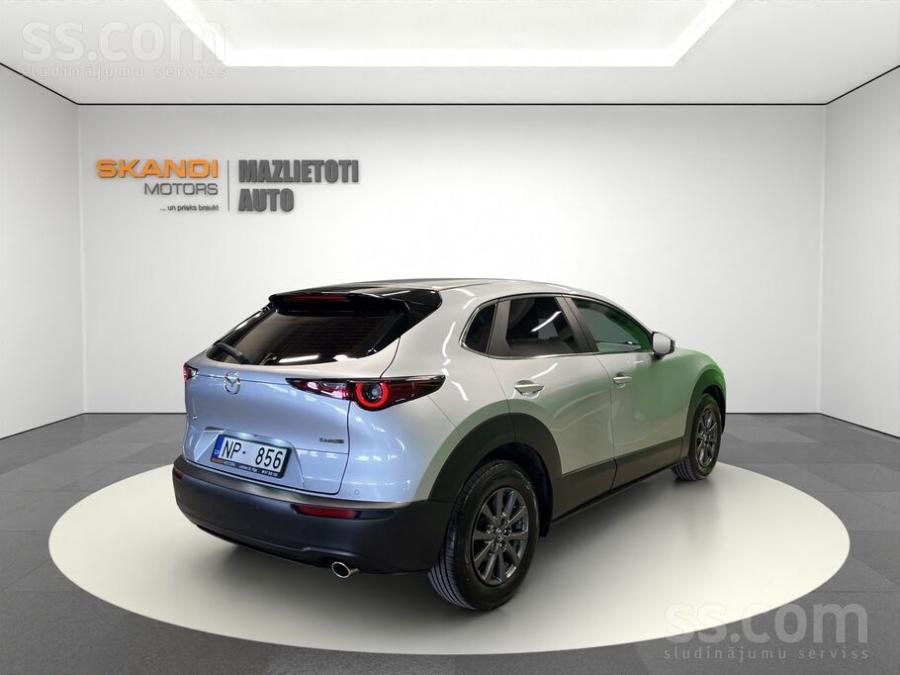 Grey Mazda CX-30 2023 in Riga, with an engine capacity of 2.00 L and mileage of 20 thousand km for 21490 €, photo 7 on AUTOMOTO.COM.LV