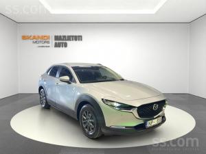 Grey Mazda CX-30 2023 in Riga, with an engine capacity of 2.00 L and mileage of 20 thousand km for 21490 €, photo 9 on AUTOMOTO.COM.LV