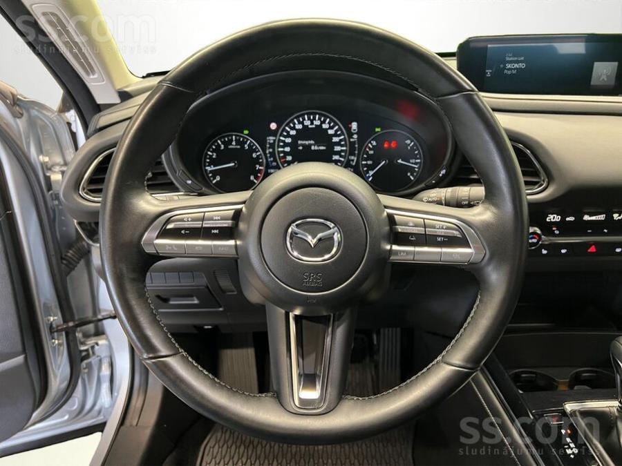 Grey Mazda CX-30 2023 in Riga, with an engine capacity of 2.00 L and mileage of 20 thousand km for 21490 €, photo 11 on AUTOMOTO.COM.LV