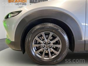 Grey Mazda CX-30 2023 in Riga, with an engine capacity of 2.00 L and mileage of 20 thousand km for 21490 €, photo 20 on AUTOMOTO.COM.LV