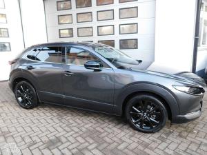 Grey Mazda CX-30 2025 in Kaunas, with an engine capacity of 2.50 L and mileage of 22 thousand km for 31072 €, photo 3 on AUTOMOTO.COM.LV