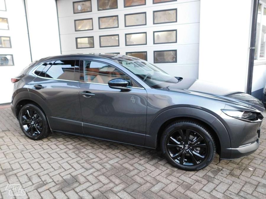 Grey Mazda CX-30 2025 in Kaunas, with an engine capacity of 2.50 L and mileage of 22 thousand km for 31072 €, photo 3 on AUTOMOTO.COM.LV