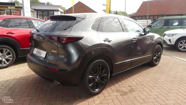 Grey Mazda CX-30 2025 in Kaunas, with an engine capacity of 2.50 L and mileage of 13 thousand km for 30067 €, photo 5 on AUTOMOTO.COM.LV