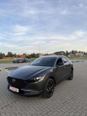 Pelēks Mazda CX-30 2025 Klaipėda, ar dzinēja tilpumu 2.49 L un nobraukumu 23 tūkst. km par 20800 €, foto  vietnē AUTOMOTO.COM.LV