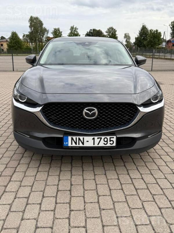 Pelēks Mazda CX-30 2023 Rīga, ar dzinēja tilpumu 2.00 L un nobraukumu 159 tūkst. km par 15200 €, foto 1 vietnē AUTOMOTO.COM.LV