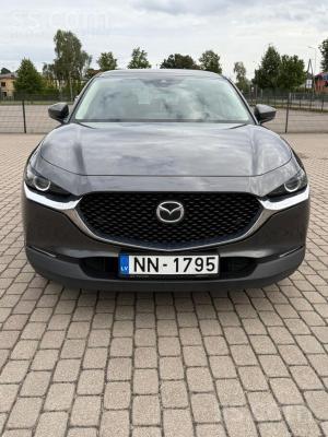 Pelēks Mazda CX-30 2023 Rīga, ar dzinēja tilpumu 2.00 L un nobraukumu 159 tūkst. km par 15200 €, foto  vietnē AUTOMOTO.COM.LV
