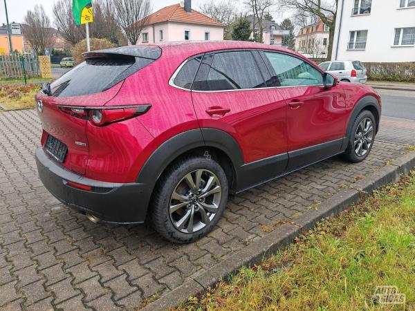 Red Mazda CX-30 2019 in Kaunas, with an engine capacity of 2.00 L and mileage of 59 thousand km for 23420 €, photo 4 on AUTOMOTO.COM.LV