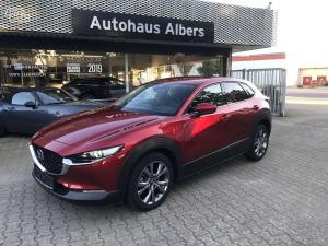 Red Mazda CX-30 2020 in Kaunas, with an engine capacity of 2.00 L and mileage of 57 thousand km for 26609 €, photo  on AUTOMOTO.COM.LV