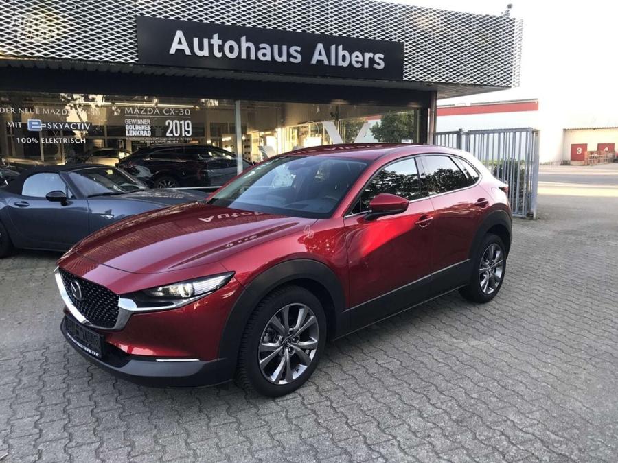 Red Mazda CX-30 2020 in Kaunas, with an engine capacity of 2.00 L and mileage of 57 thousand km for 26609 €, photo 1 on AUTOMOTO.COM.LV