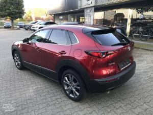 Red Mazda CX-30 2020 in Kaunas, with an engine capacity of 2.00 L and mileage of 57 thousand km for 26609 €, photo 5 on AUTOMOTO.COM.LV
