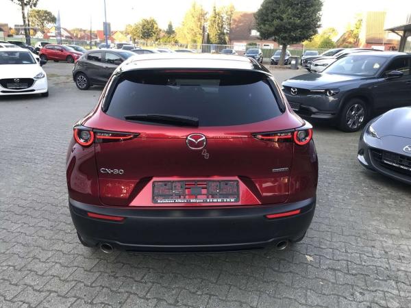 Sarkans Mazda CX-30 2020 Kauņa, ar dzinēja tilpumu 2.00 L un nobraukumu 57 tūkst. km par 26609 €, foto 6 vietnē AUTOMOTO.COM.LV