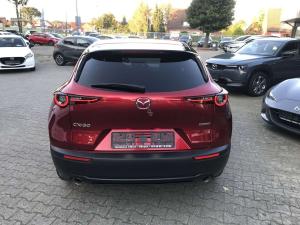 Red Mazda CX-30 2020 in Kaunas, with an engine capacity of 2.00 L and mileage of 57 thousand km for 26609 €, photo 6 on AUTOMOTO.COM.LV