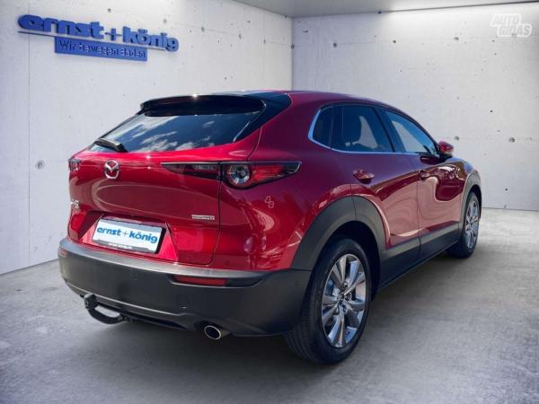 Red Mazda CX-30 2020 in Kaunas, with an engine capacity of 2.00 L and mileage of 66 thousand km for 23399 €, photo 3 on AUTOMOTO.COM.LV