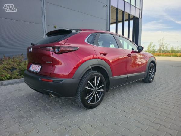 Mazda CX-30 2020 Viļņa vietnē Sarkans Mazda CX-30 2020 Viļņa, ar dzinēja tilpumu 2.00 L un nobraukumu 150 tūkst. km par 15000 €, foto 6 vietnē AUTOMOTO.COM.LV