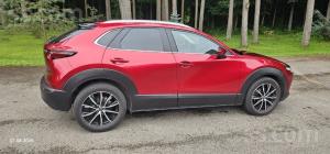 Sarkans Mazda CX-30 2021 Rīga, ar dzinēja tilpumu 2.00 L un nobraukumu 35 tūkst. km par 18700 €, foto  vietnē AUTOMOTO.COM.LV