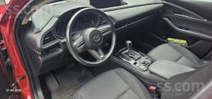 Red Mazda CX-30 2021 in Riga, with an engine capacity of 2.00 L and mileage of 35 thousand km for 18700 €, photo 5 on AUTOMOTO.COM.LV