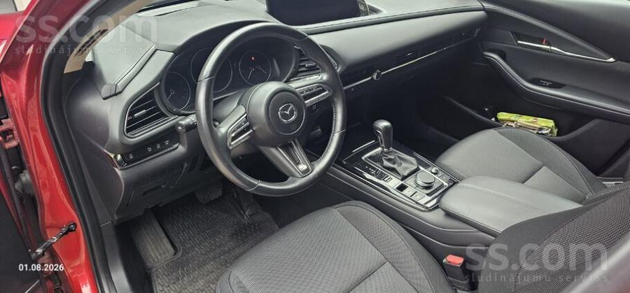 Red Mazda CX-30 2021 in Riga, with an engine capacity of 2.00 L and mileage of 35 thousand km for 18700 €, photo 5 on AUTOMOTO.COM.LV