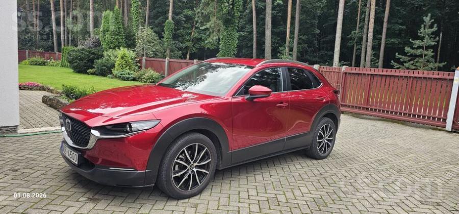 Red Mazda CX-30 2021 in Riga, with an engine capacity of 2.00 L and mileage of 35 thousand km for 18700 €, photo 10 on AUTOMOTO.COM.LV