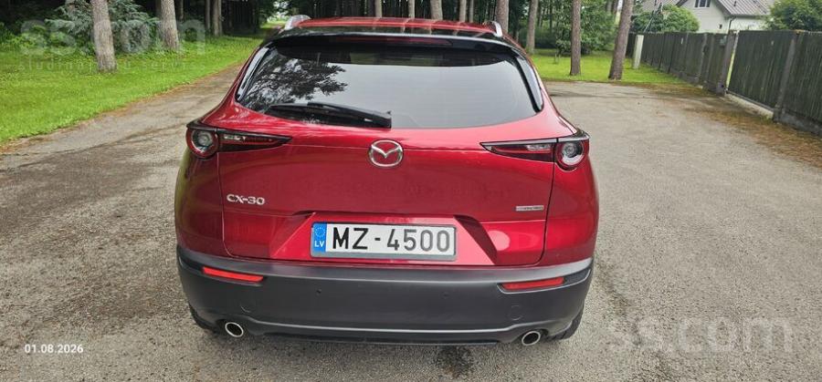 Red Mazda CX-30 2021 in Riga, with an engine capacity of 2.00 L and mileage of 35 thousand km for 18700 €, photo 11 on AUTOMOTO.COM.LV