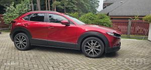 Red Mazda CX-30 2021 in Riga, with an engine capacity of 2.00 L and mileage of 35 thousand km for 18700 €, photo 12 on AUTOMOTO.COM.LV