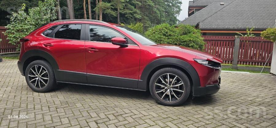Red Mazda CX-30 2021 in Riga, with an engine capacity of 2.00 L and mileage of 35 thousand km for 18700 €, photo 12 on AUTOMOTO.COM.LV