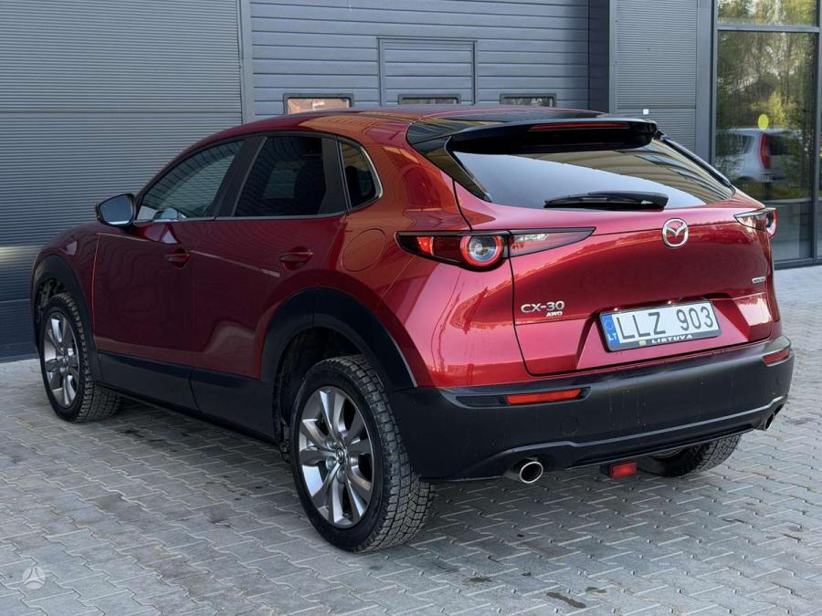 Red Mazda CX-30 2021 in Vilnius, with an engine capacity of 2.49 L and mileage of 73 thousand km for 16111 €, photo 4 on AUTOMOTO.COM.LV