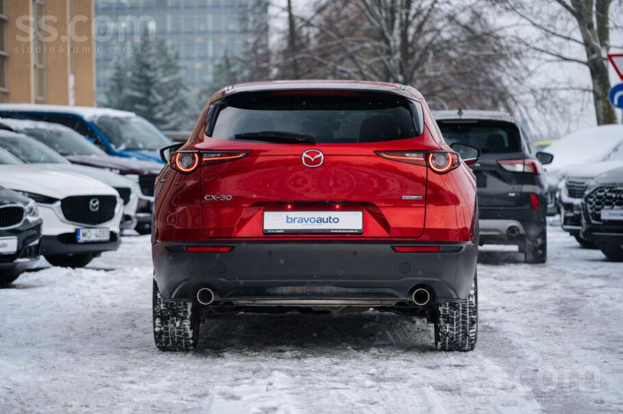 Red Mazda CX-30 2020 in Riga, with an engine capacity of 2.00 L and mileage of 95 thousand km for 18990 €, photo 5 on AUTOMOTO.COM.LV