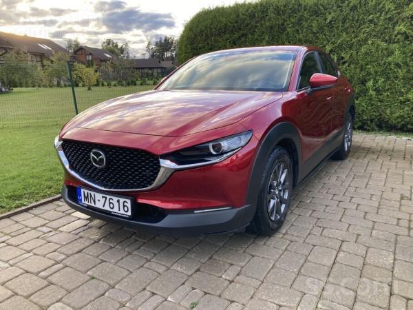 Sarkans Mazda CX-30 2020 Rīga, ar dzinēja tilpumu 2.00 L un nobraukumu 40 tūkst. km par 18500 €, foto 1 vietnē AUTOMOTO.COM.LV