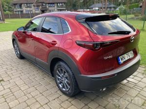 Red Mazda CX-30 2020 in Riga, with an engine capacity of 2.00 L and mileage of 42 thousand km for 17900 €, photo 5 on AUTOMOTO.COM.LV