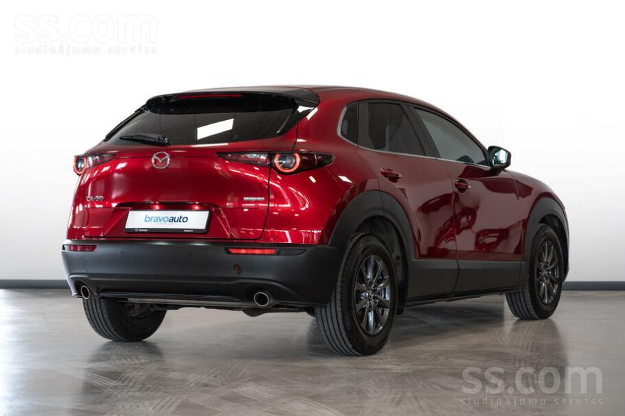 Red Mazda CX-30 2021 in Riga, with an engine capacity of 2.00 L and mileage of 50 thousand km for 18490 €, photo 7 on AUTOMOTO.COM.LV