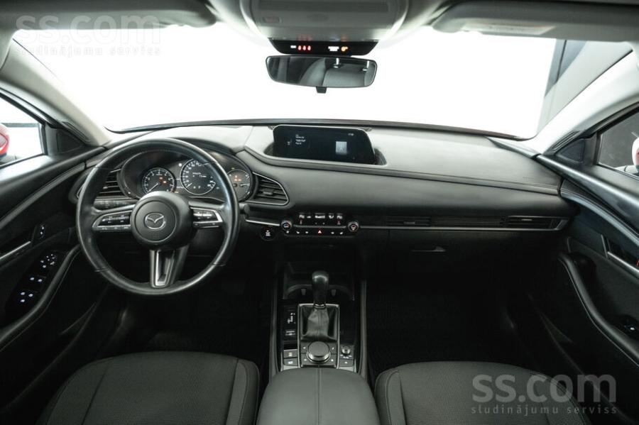 Red Mazda CX-30 2021 in Riga, with an engine capacity of 2.00 L and mileage of 50 thousand km for 18490 €, photo 8 on AUTOMOTO.COM.LV