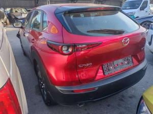 Красный Мазда CX-30 2025 в Калвария, объемом двигателя 2.00 л и пробегом 9 тыс. км за 9999 €, фото 4 на AUTOMOTO.COM.LV