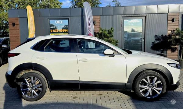White Mazda CX-30 2019 in Taurage, with an engine capacity of 2.00 L and mileage of 158 thousand km for 14300 €, photo 6 on AUTOMOTO.COM.LV