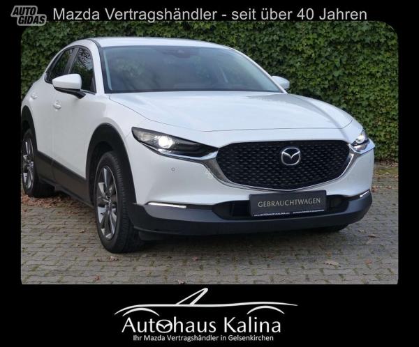 White Mazda CX-30 2020 in Kaunas, with an engine capacity of 2.00 L and mileage of 67 thousand km for 21937 €, photo 1 on AUTOMOTO.COM.LV
